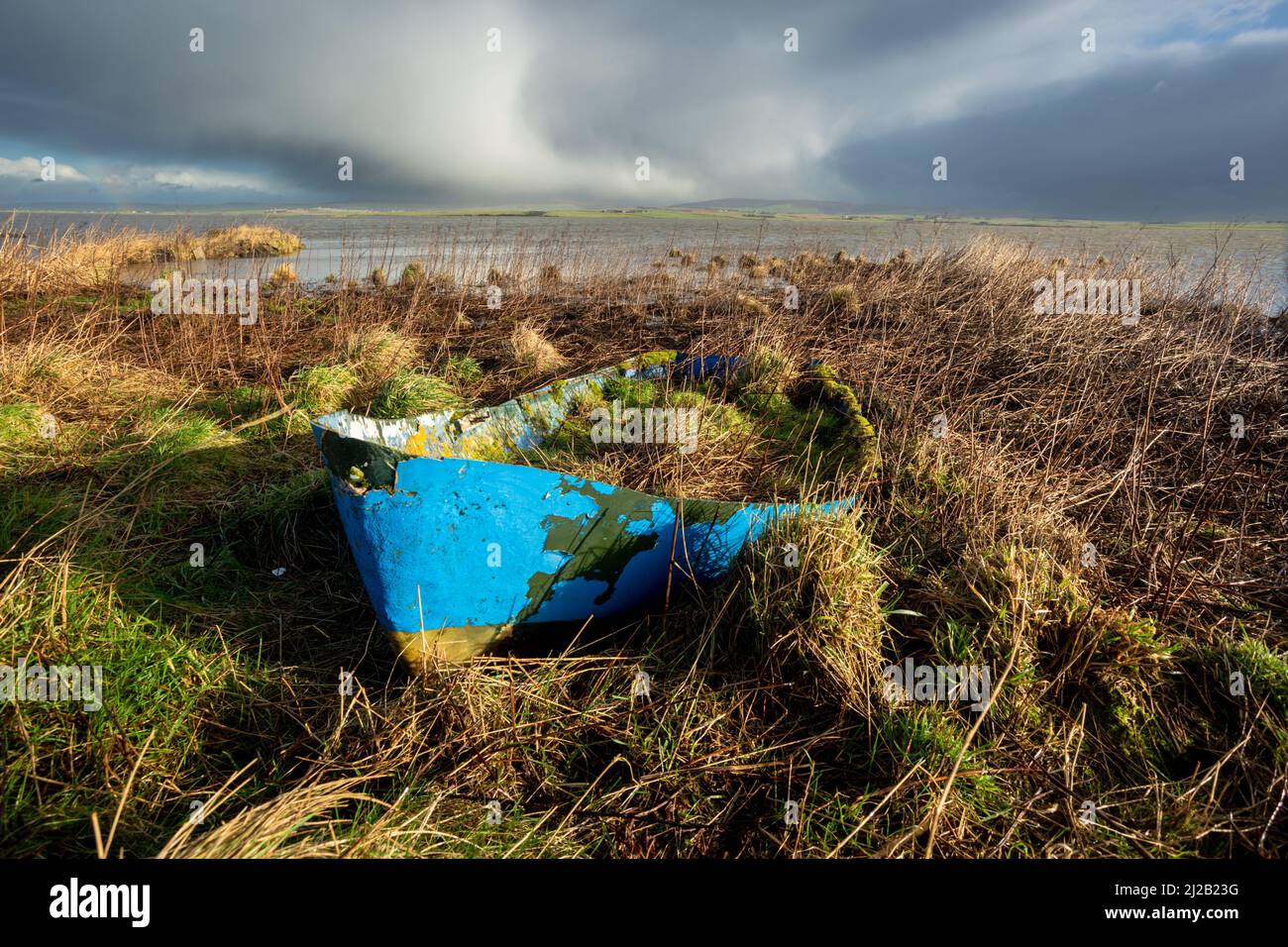 Old rowing boat on the loch Stenness, Orkney Islands, UK Stock Photo ...