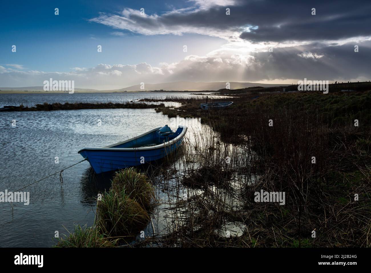 Old rowing boat on the loch Stenness, Orkney Islands, UK Stock Photo ...