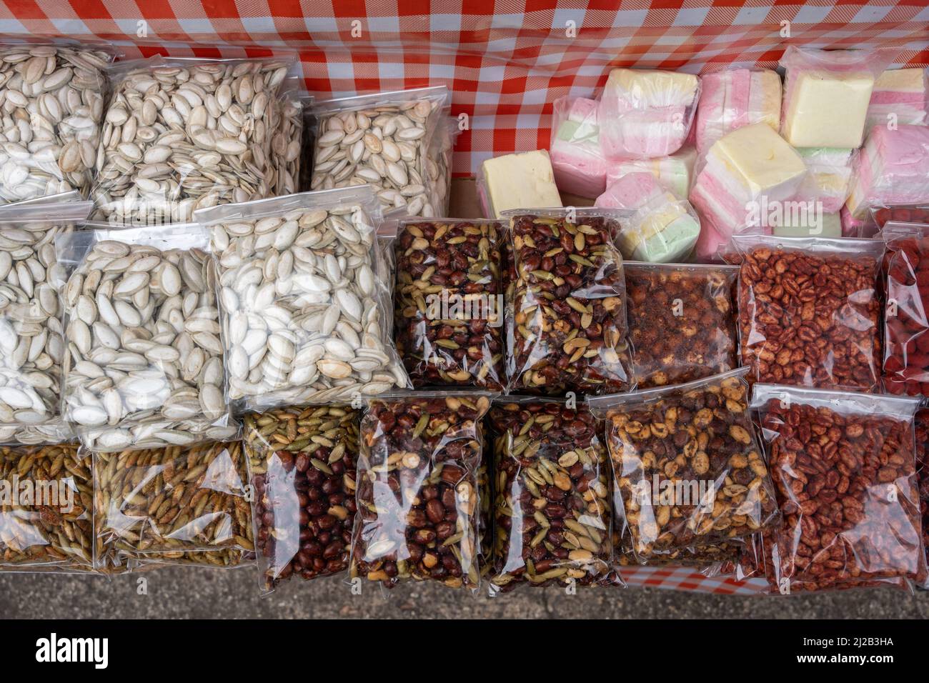Display of Mexican pepita mix, seeds for sale on the market, Mexico ...