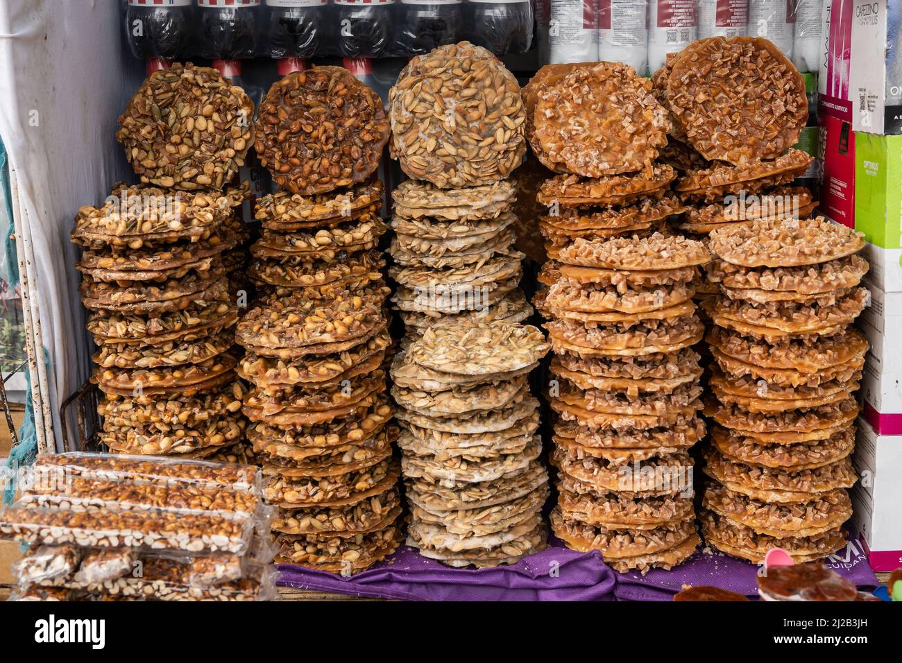 Mexican sweet snack (palanquetas) with peanuts, seeds and honey ...