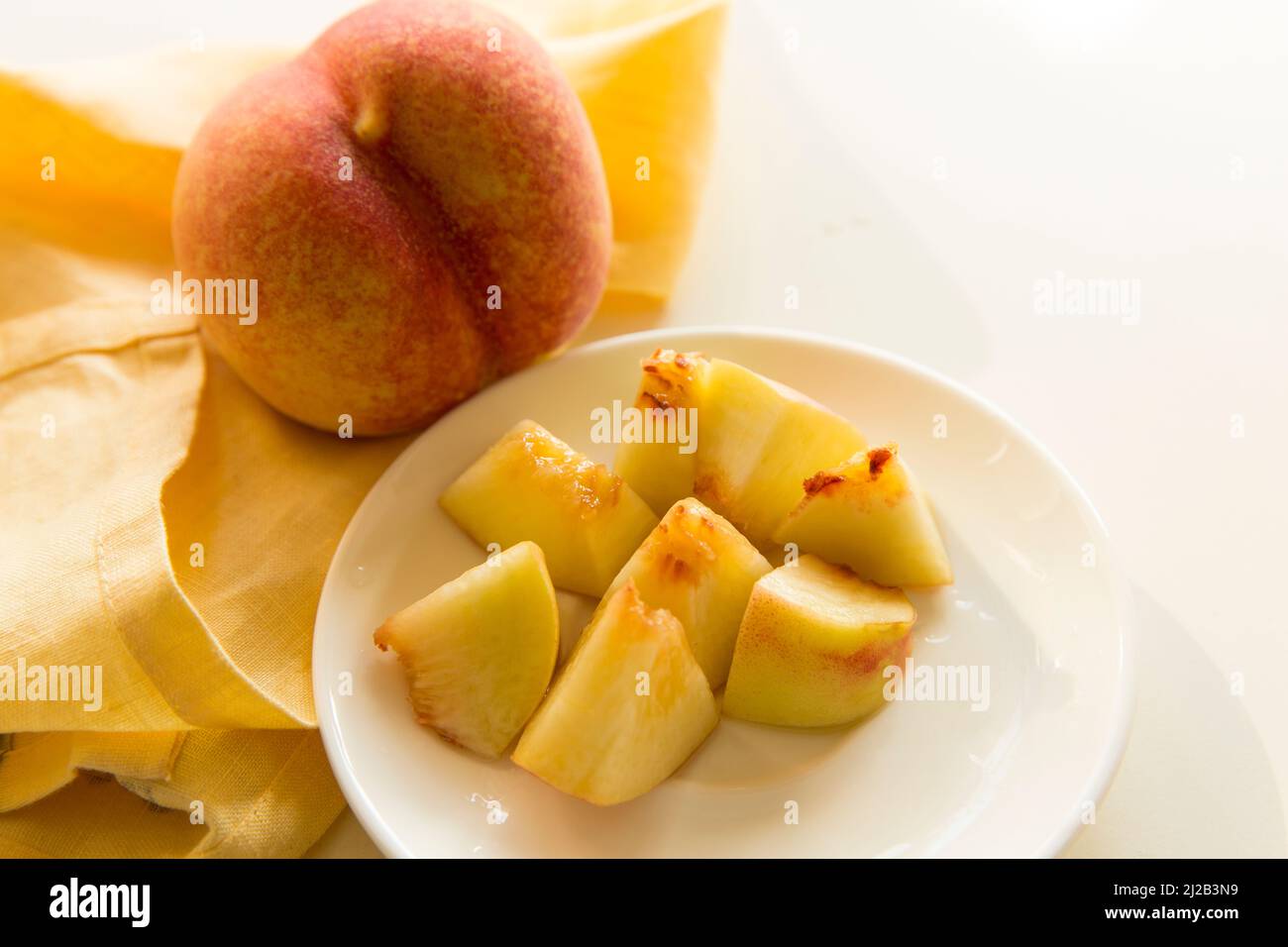 Peach slices close-up Stock Photo - Alamy