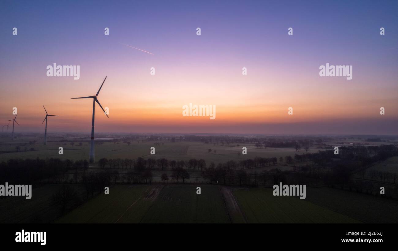 Wind power plant at sunrise hi-res stock photography and images - Alamy