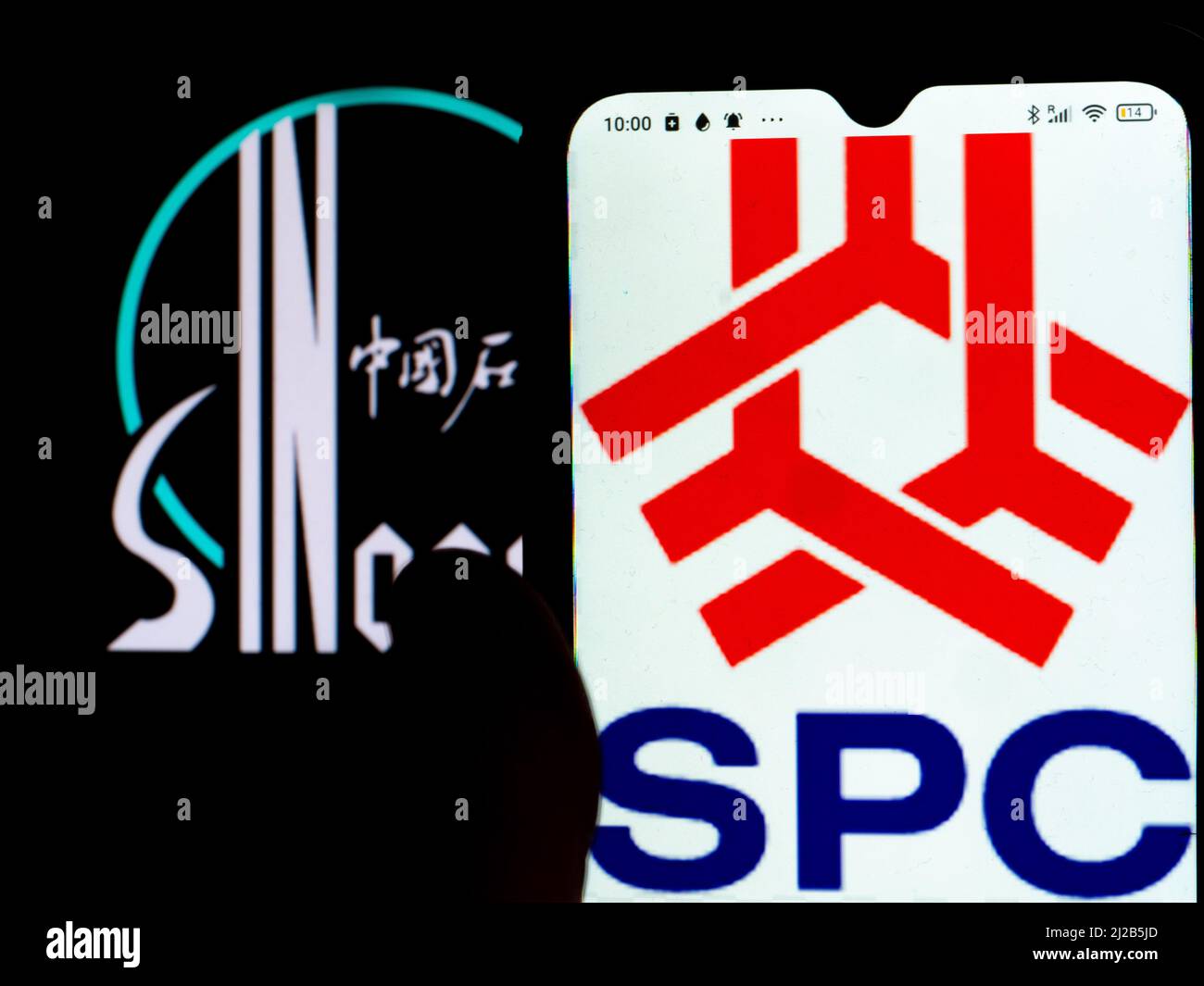 In this photo illustration, the Sinopec Shanghai Petrochemical Company ...