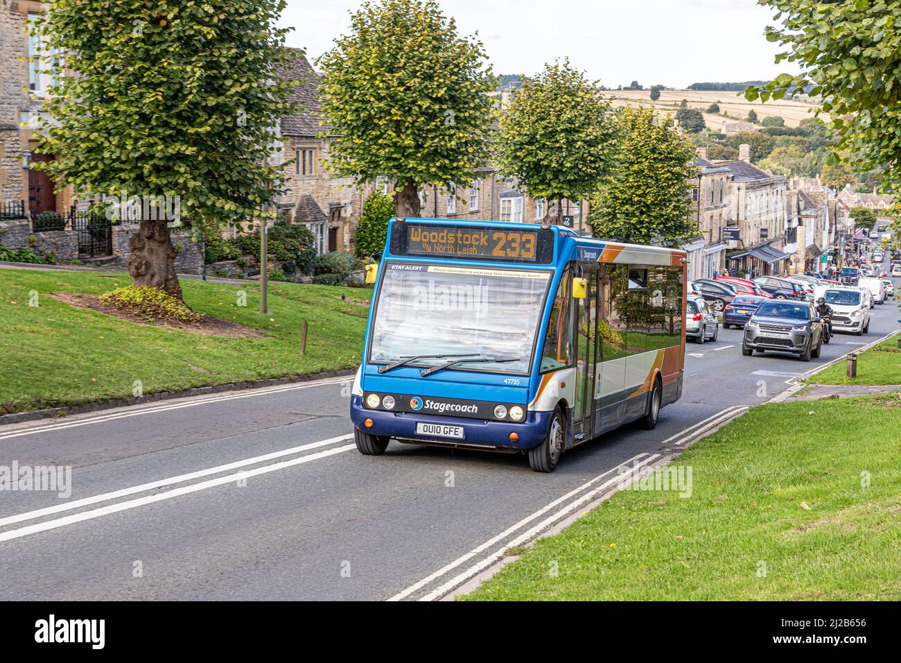 A Stagecoach bus to Woodstock driving up The Hill in the Cotswold town ...