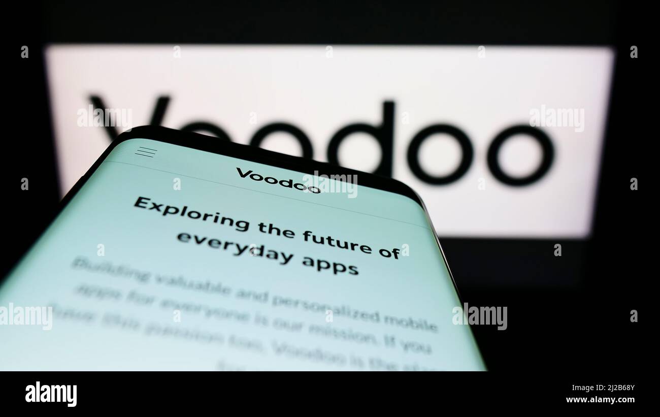 Mobile phone with webpage of French video games company Voodoo SAS on ...