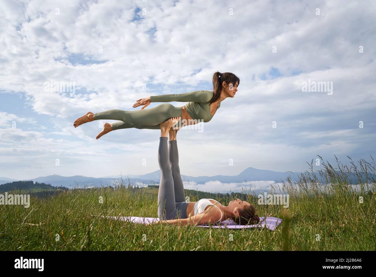 Acrobatic exercises hi-res stock photography and images - Alamy