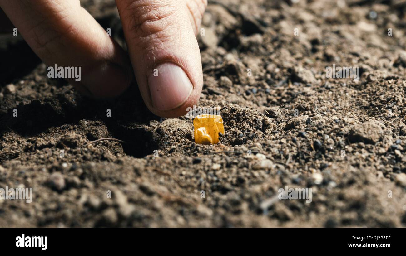 Close up hand planting corn hi-res stock photography and images - Alamy