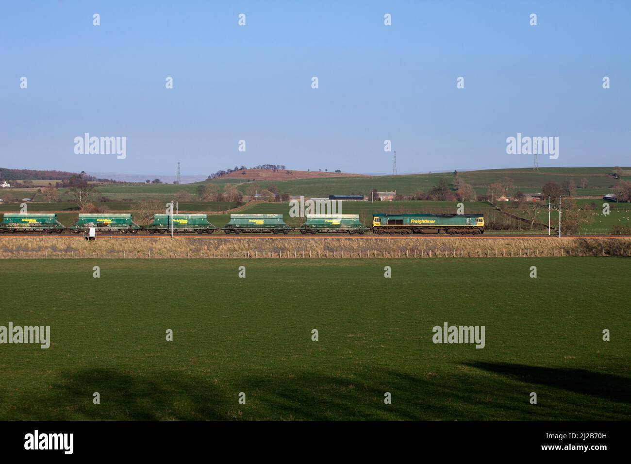 Freightliner class 66 diesel locomotive 66557 hauling an empty ...