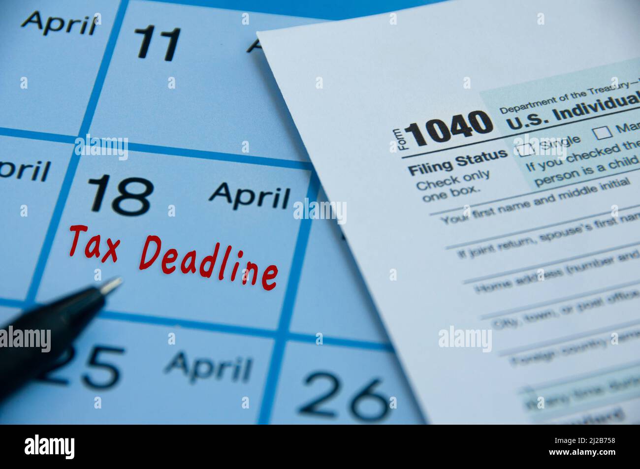 Tax deadline text on April calendar - Tax submission due date Stock ...