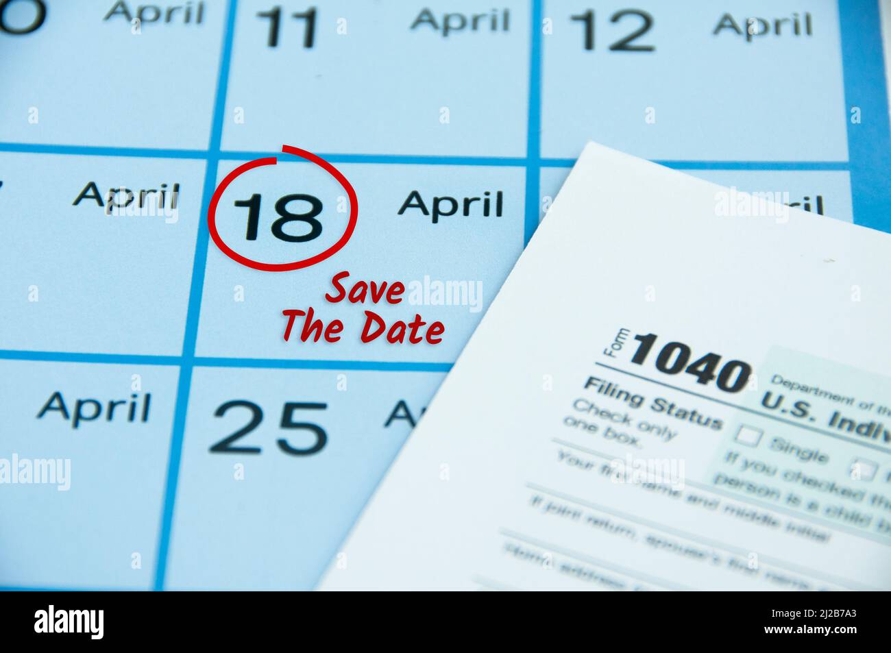 Save the date text on April calendar - Tax submission due date Stock ...