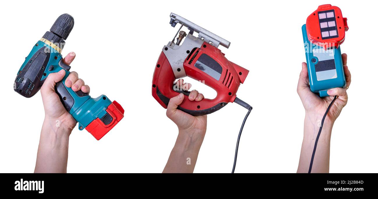 Hand tools. Hands holding construction tools isolated on white ...