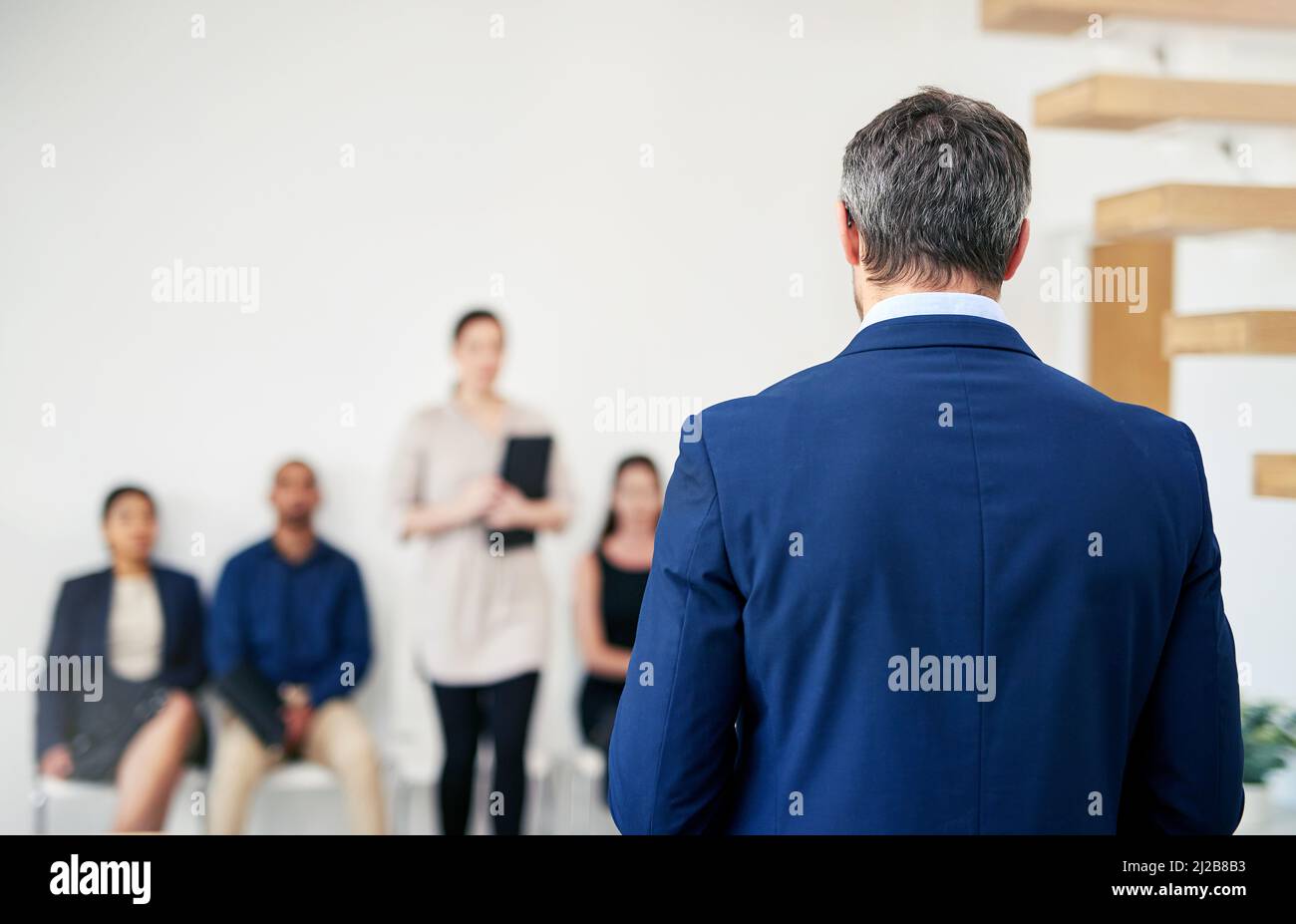 Next, please. Shot of an unrecognizable interviewer calling the next ...