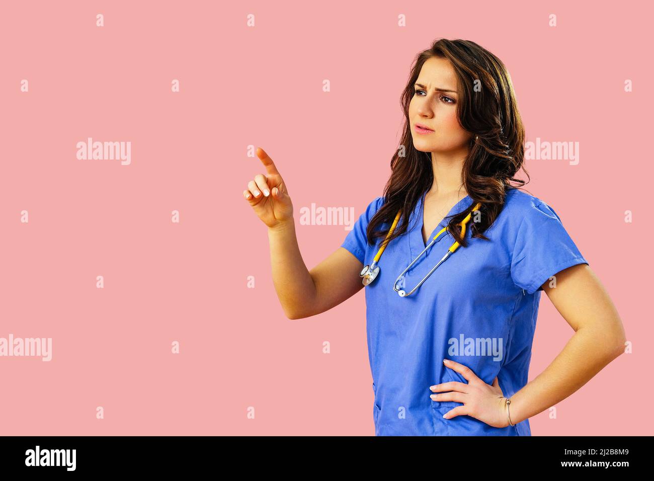 Nurse pointing finger hi-res stock photography and images - Alamy