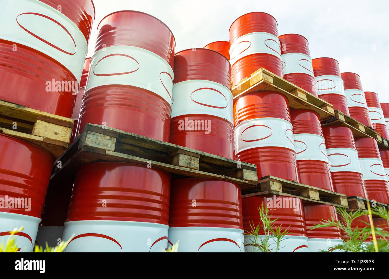 Red-white barrels with oil. Warehousing containers ready for shipment ...