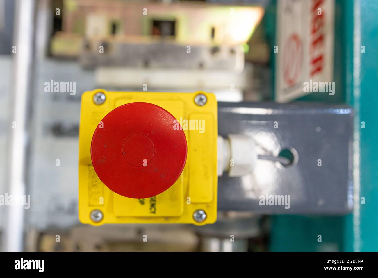 Red Emergency cutoff stop button on a factory machine equipment Stock ...