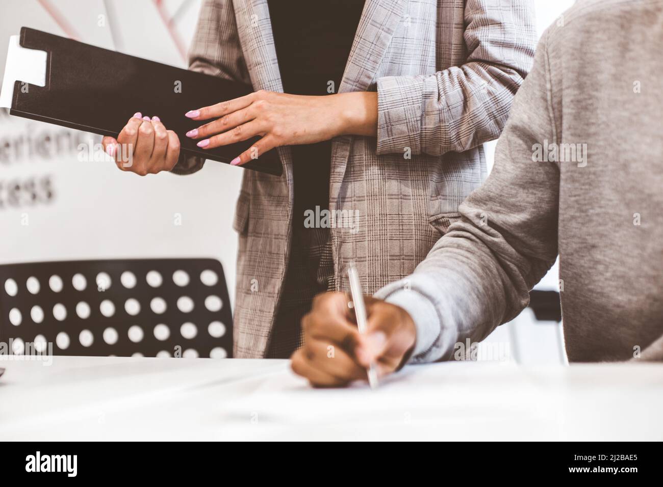 African american man signing contract, black man hand putting signature ...