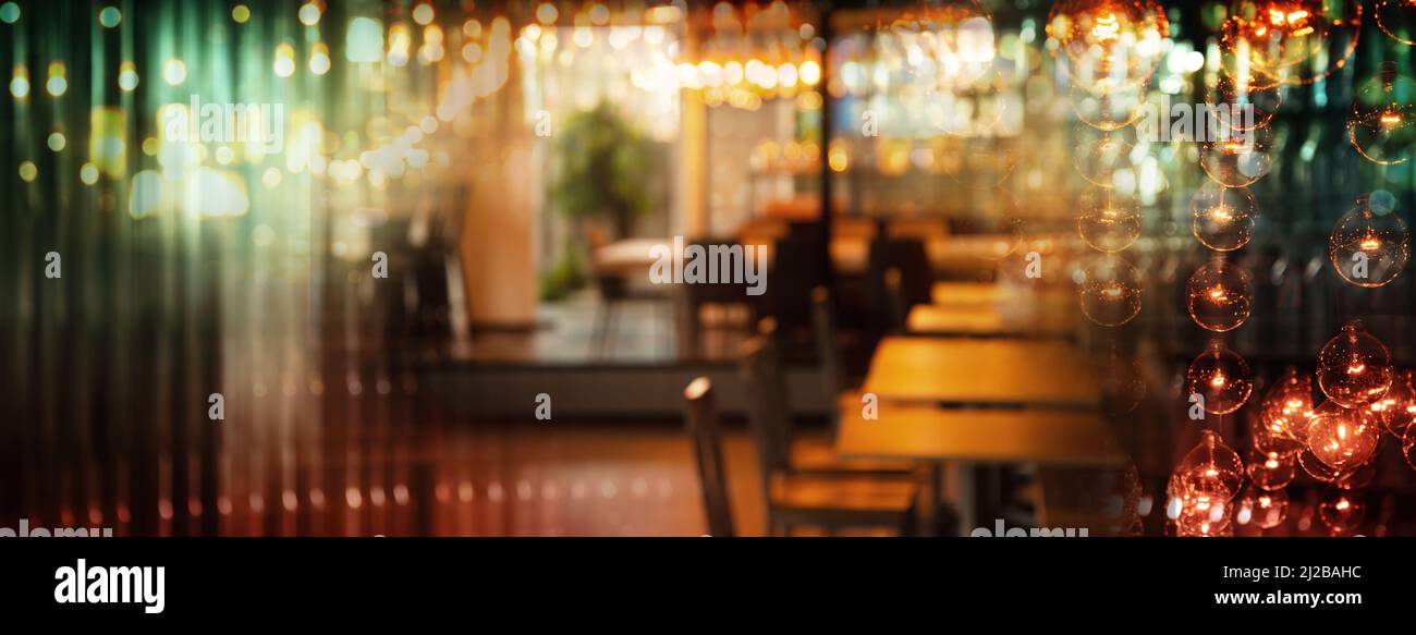 blur glowing lamp abstract light at party night in bar or pub banner ...