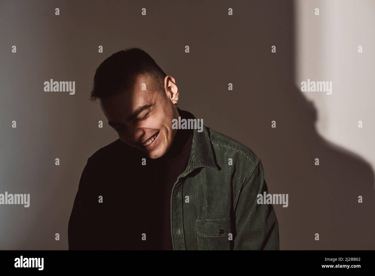Real people laughing studio hi-res stock photography and images - Alamy