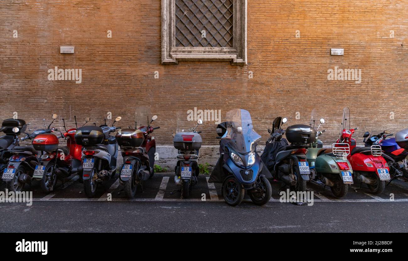 Parked bikes scooters on street hi-res stock photography and images - Alamy