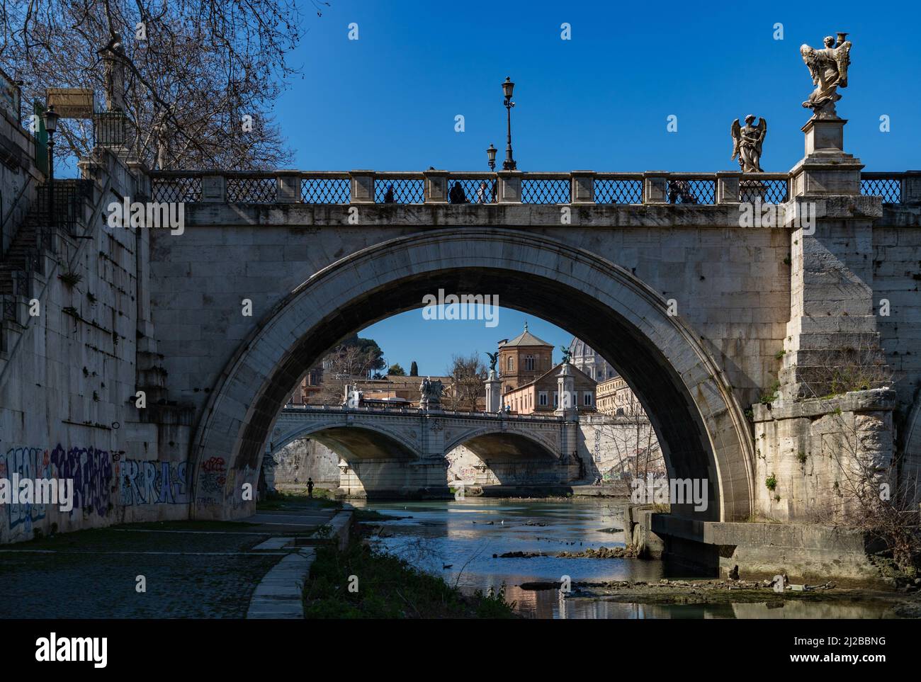 A picture of the Vittorio Emanuele II Bridge peeking through one of the ...