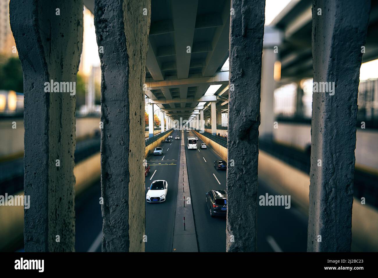 A high angle shot of cars on the highway under bridge Stock Photo - Alamy