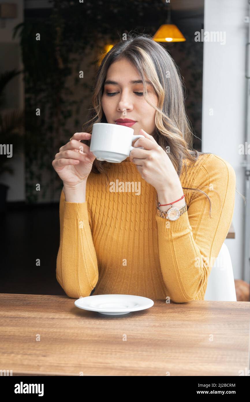 Woman coffee dinner table hi-res stock photography and images - Alamy