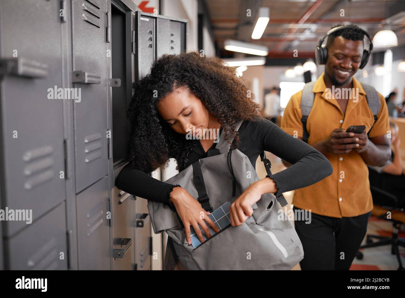 Young diverse students on campus getting ready for the day Stock Photo ...