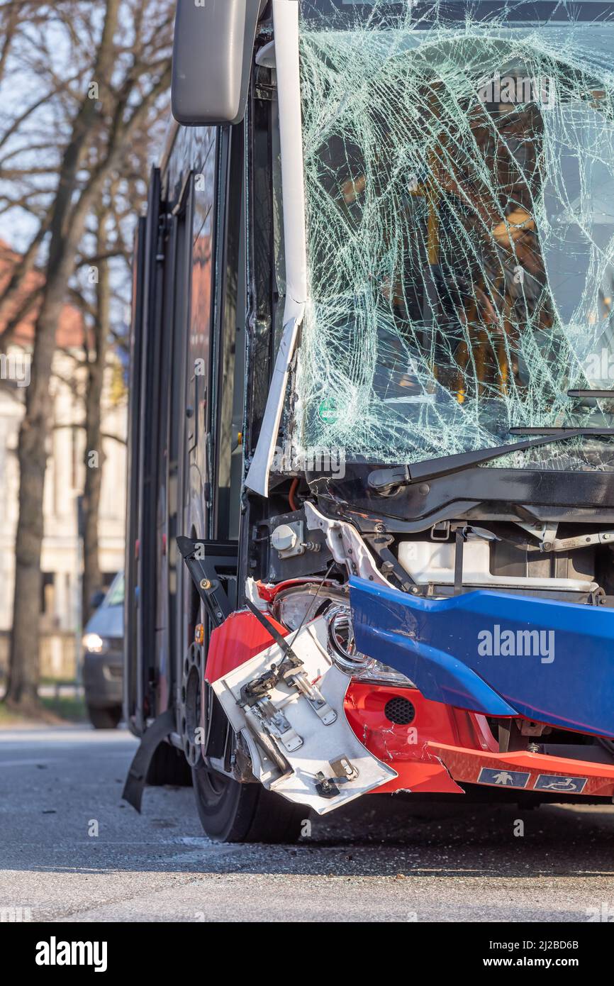 Bus with frontal damage from an accident Stock Photo - Alamy