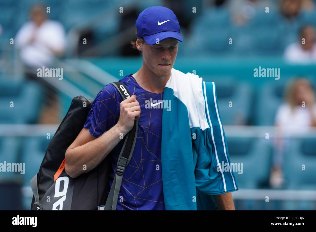 MIAMI GARDENS, FLORIDA - MARCH 30: Jannik Sinner of Italy leaves the court after retiring in his ...