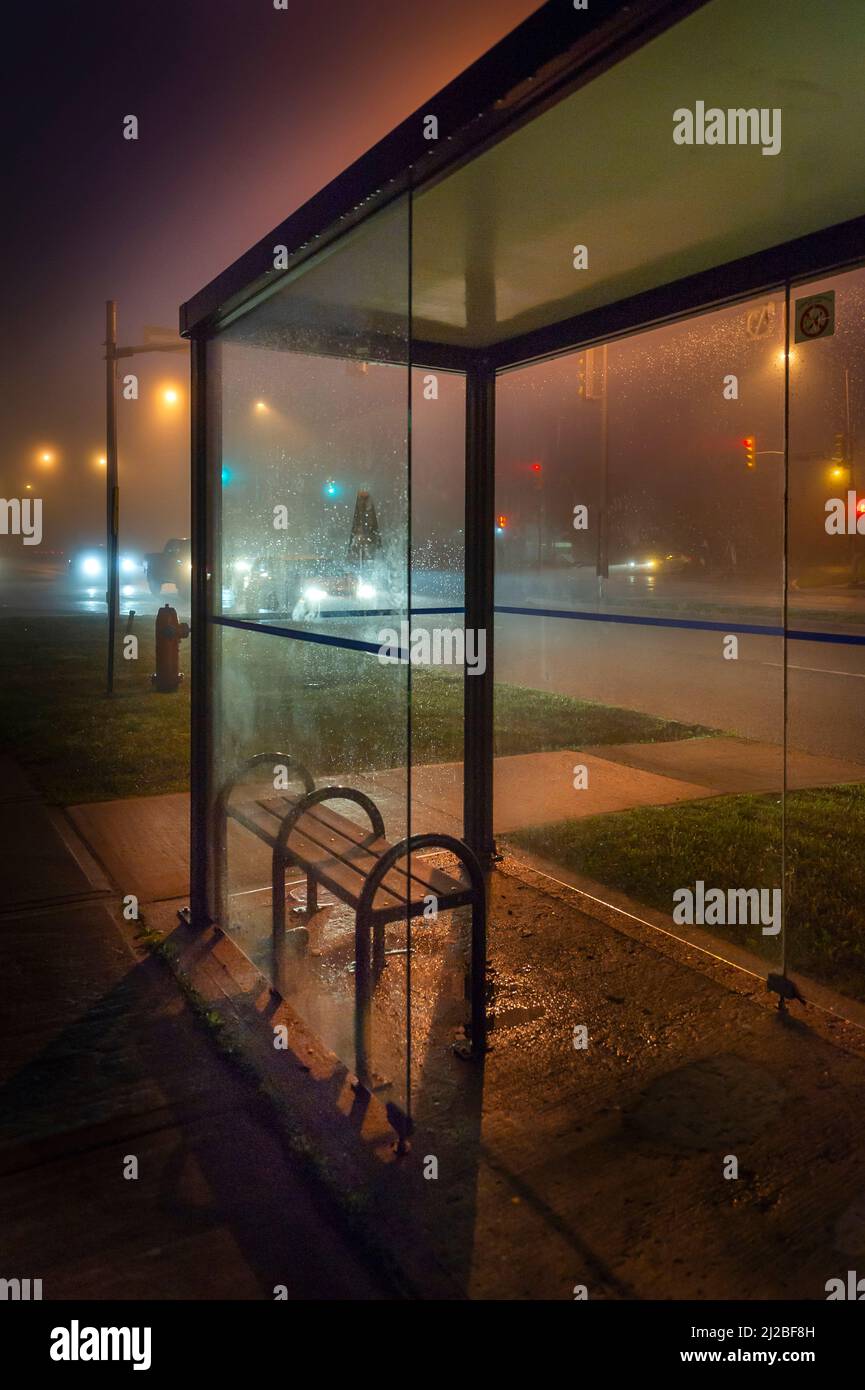 Empty bus stop at night Stock Photo - Alamy