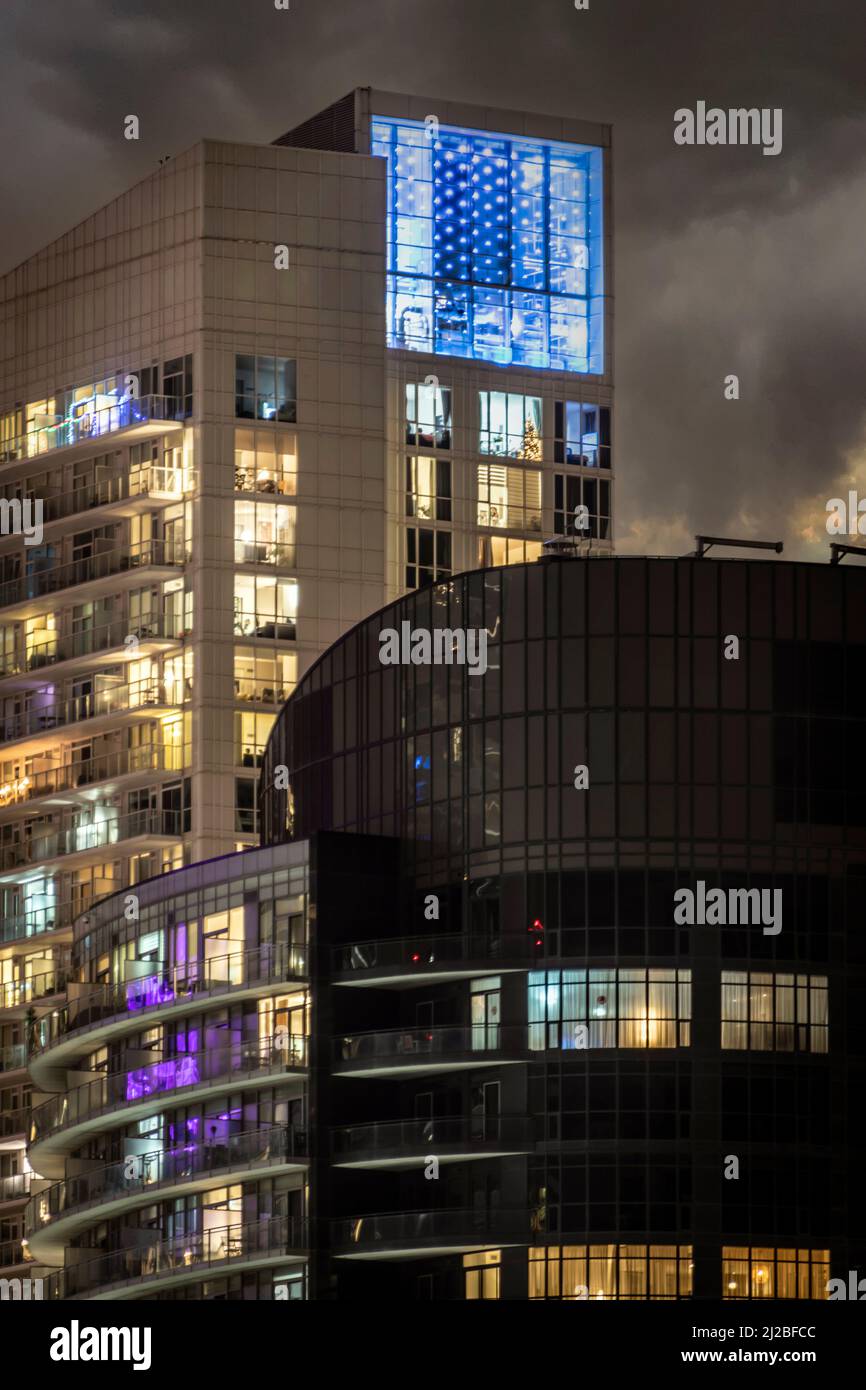 Widows of an apartment building in downtown Toronto illuminated at ...