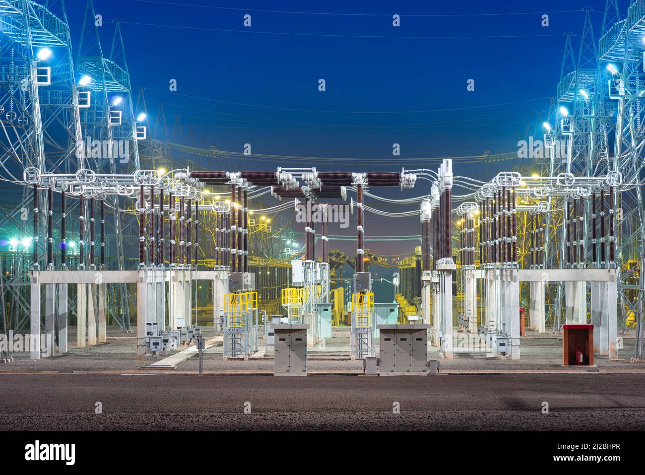 View of an electric substation at night Stock Photo - Alamy
