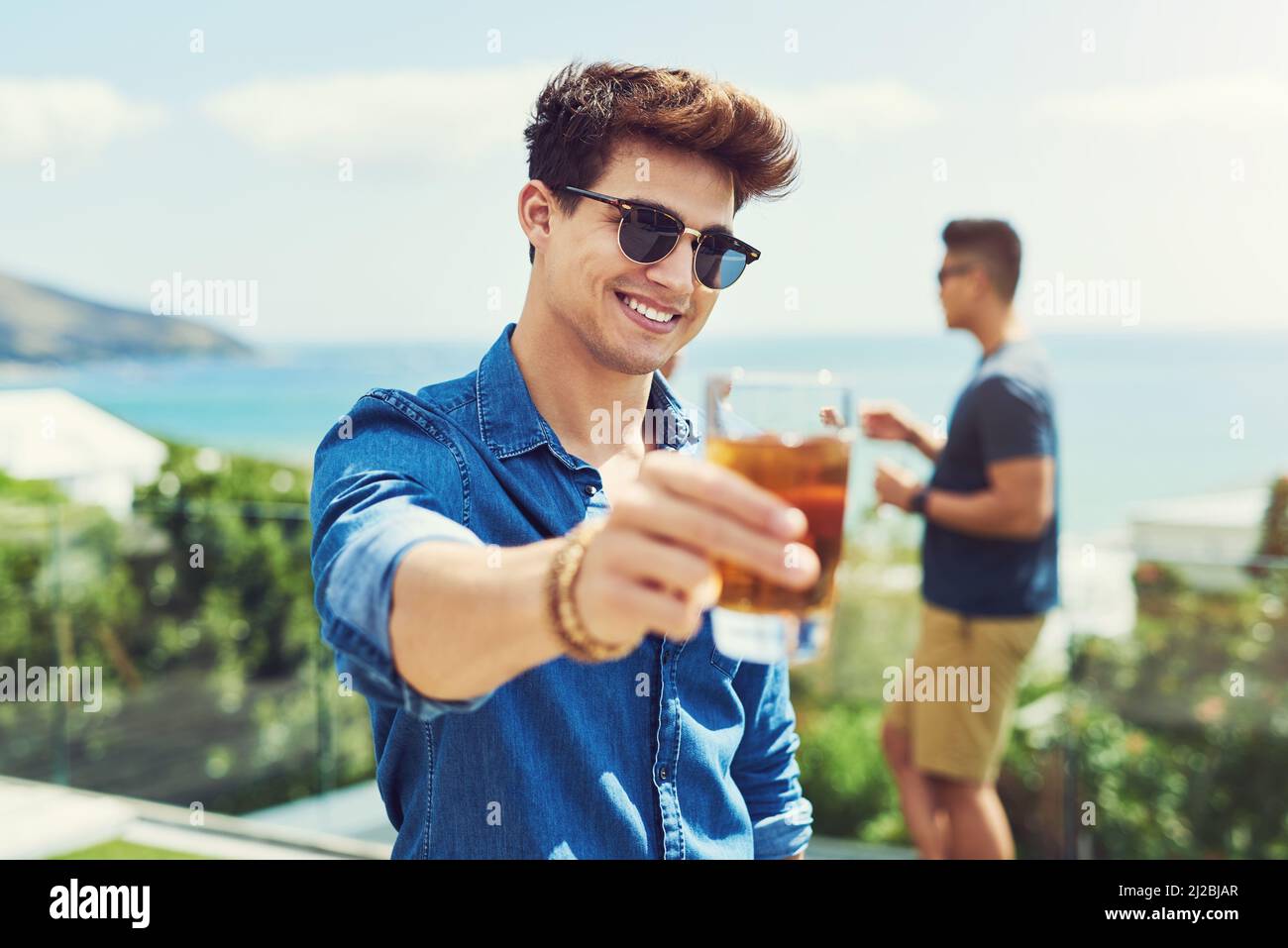 Its always a good time for a toast. Portrait of a handsome young man ...