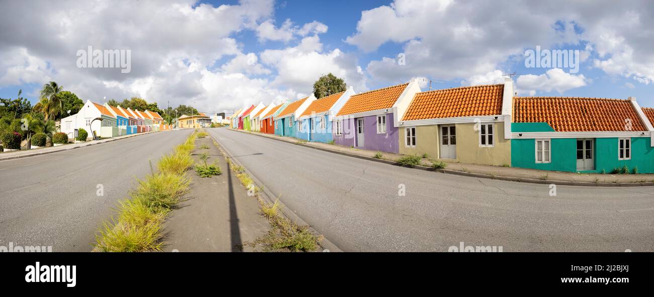 Small colorful houses along the road somewhere in Willemstad, Curacao ...