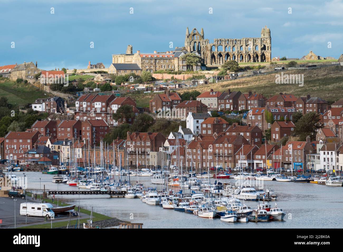 View of Whitby harbour showing the Church and Abbey Stock Photo - Alamy
