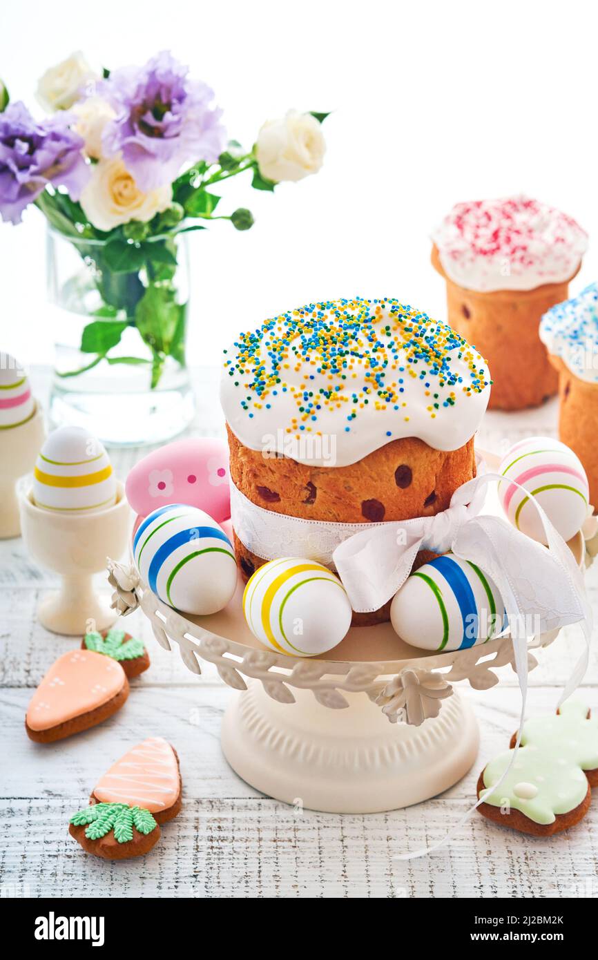Traditional Easter sweet bread or cakes with white icing and sugar ...