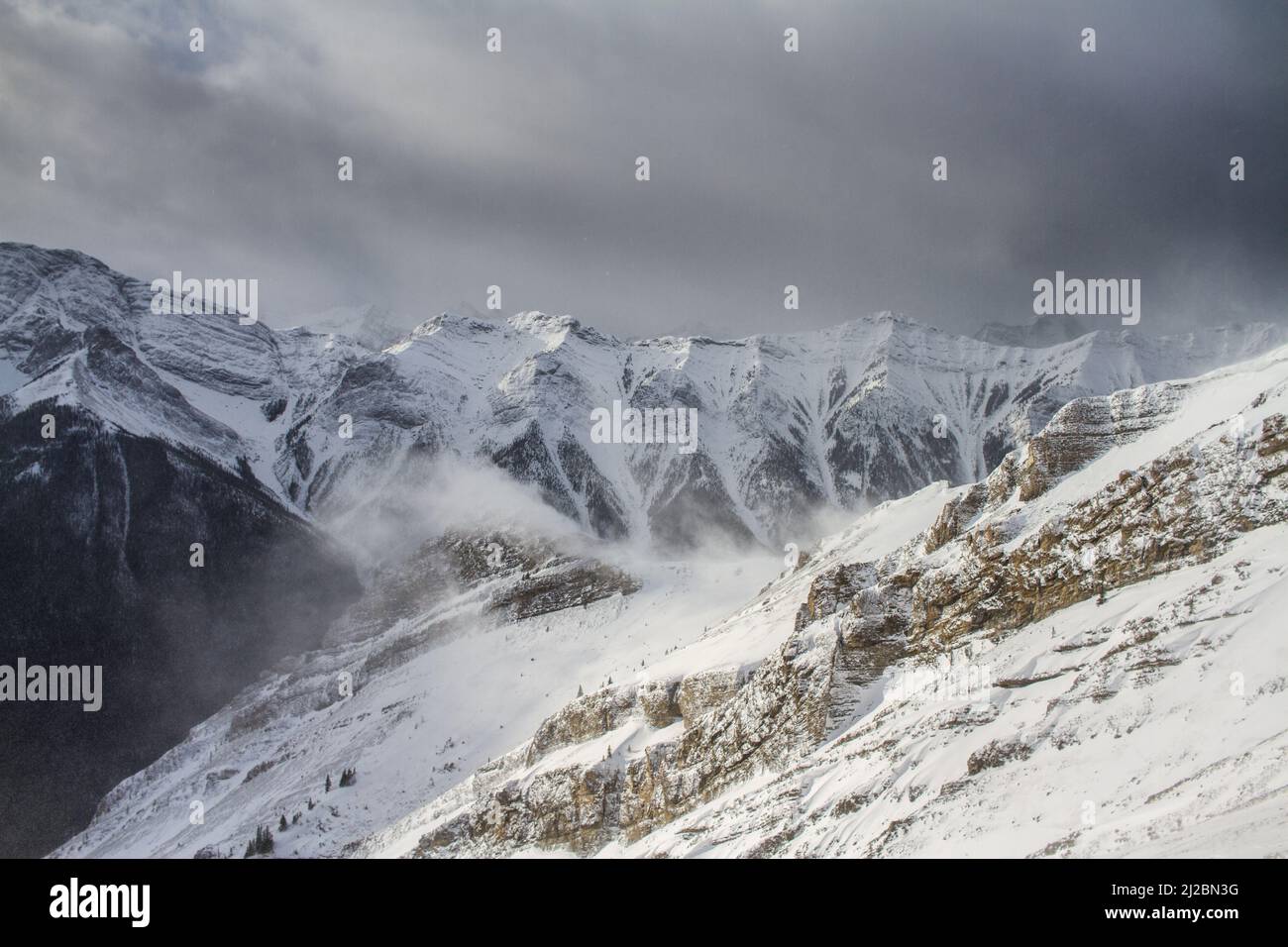 A gloomy view of snowy winds in Kananaskis, Alberta, Canada Stock Photo ...