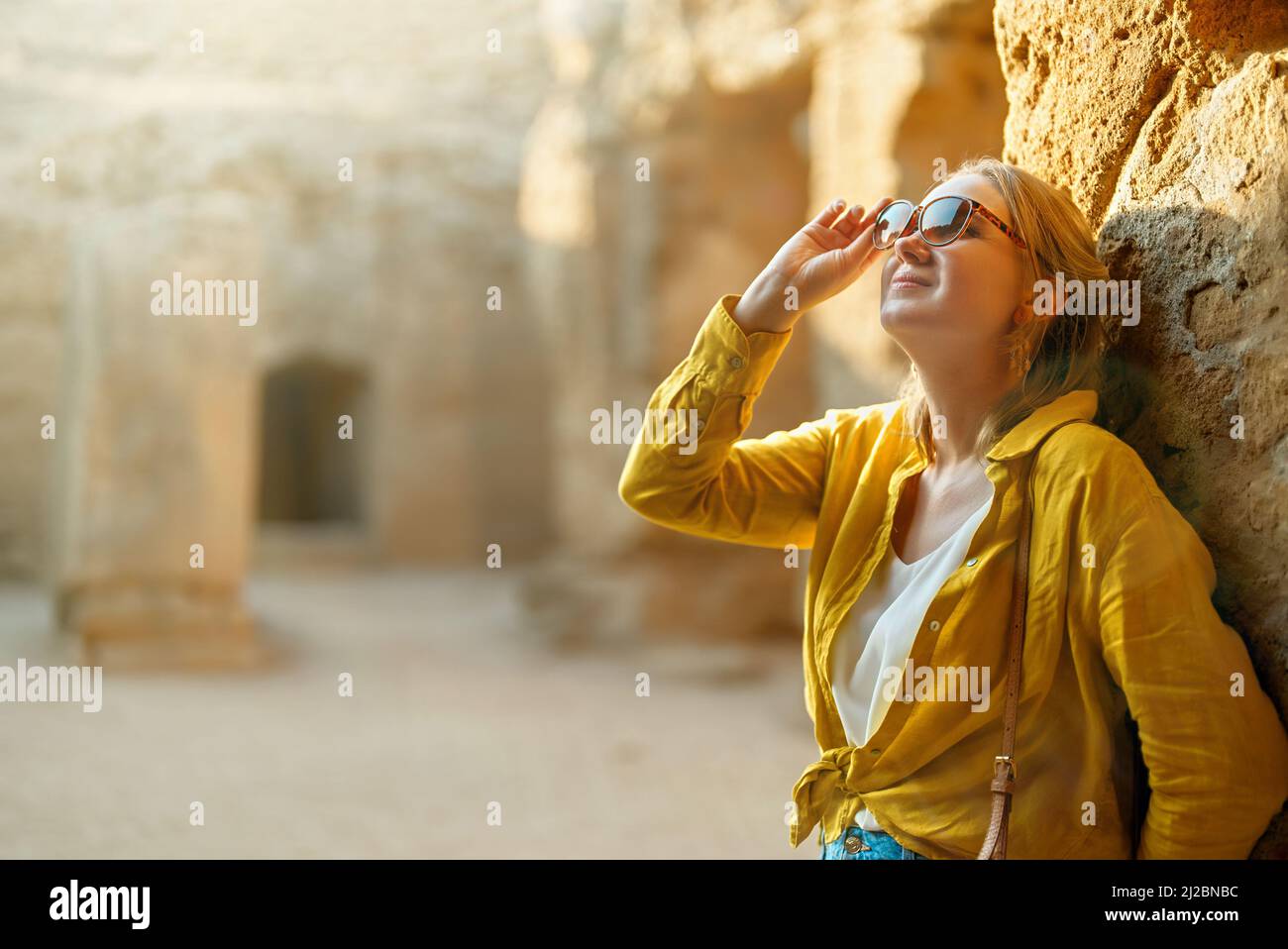 Woman visiting Tombs of the Kings in Paphos Stock Photo - Alamy