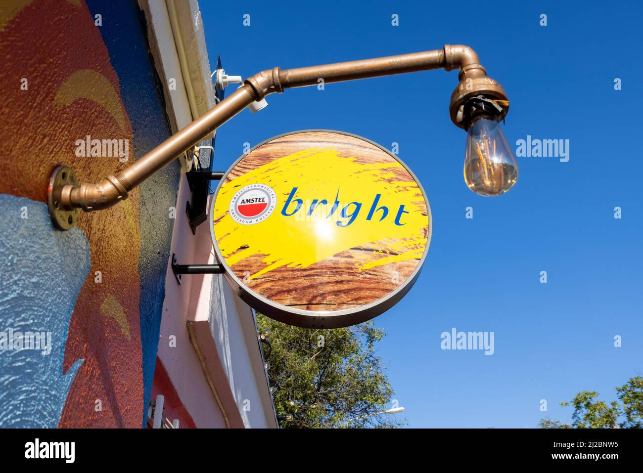 Sign of Amstel bright at a wall of a bar in Willemstad, Curacao Stock ...