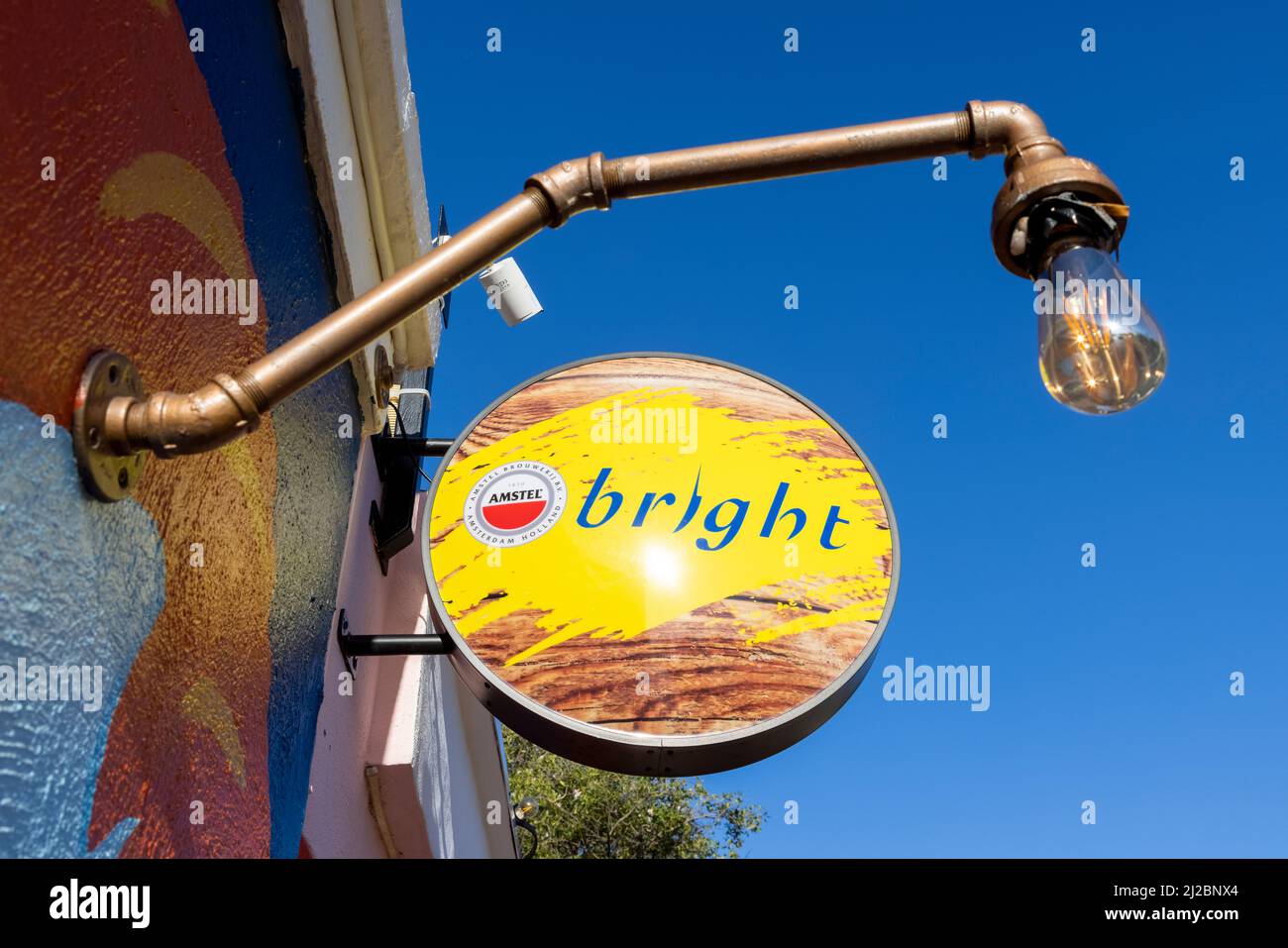 Sign of Amstel bright at a wall of a bar in Willemstad, Curacao Stock ...