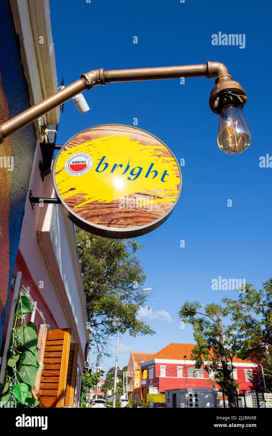 Sign of Amstel bright at a wall of a bar in Willemstad, Curacao Stock ...