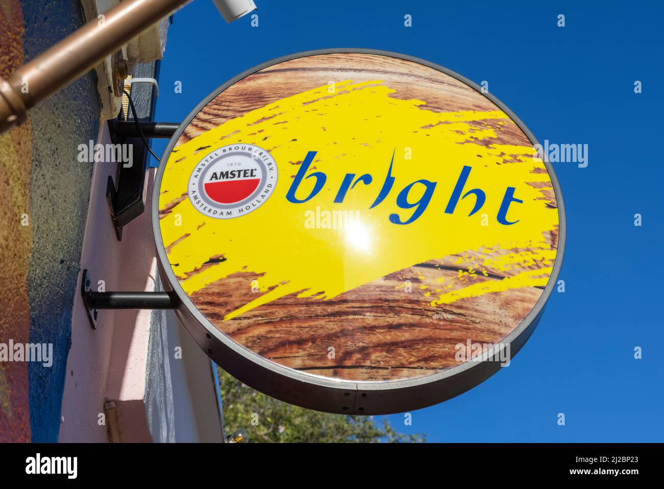 Sign of Amstel bright at a wall of a bar in Willemstad, Curacao Stock ...