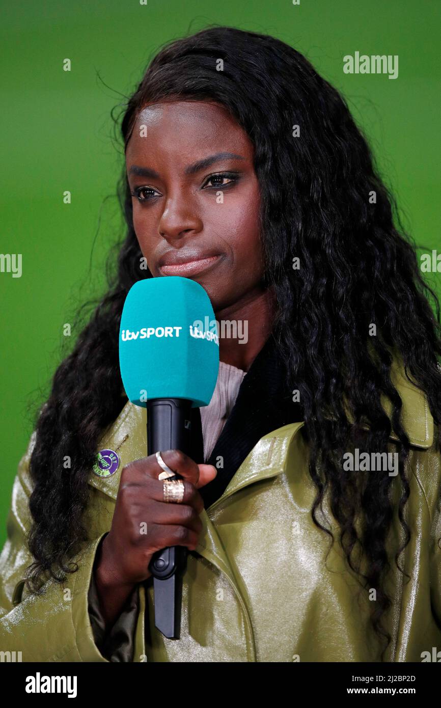 Football pundit and former player Eniola Aluko works on the sidelines ...