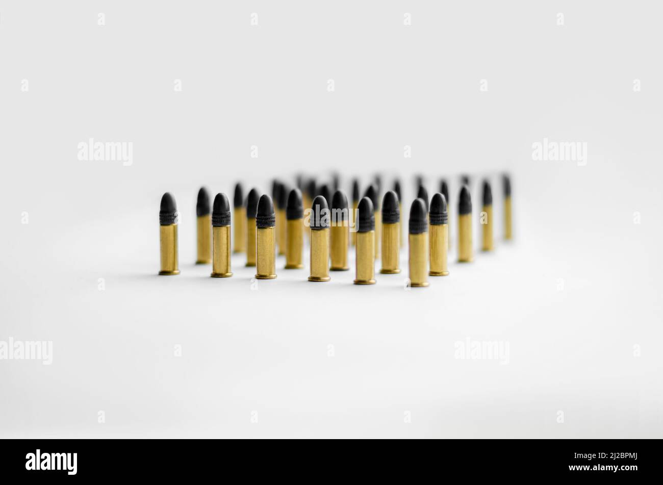 set of bullets with same caliber on white background Stock Photo - Alamy