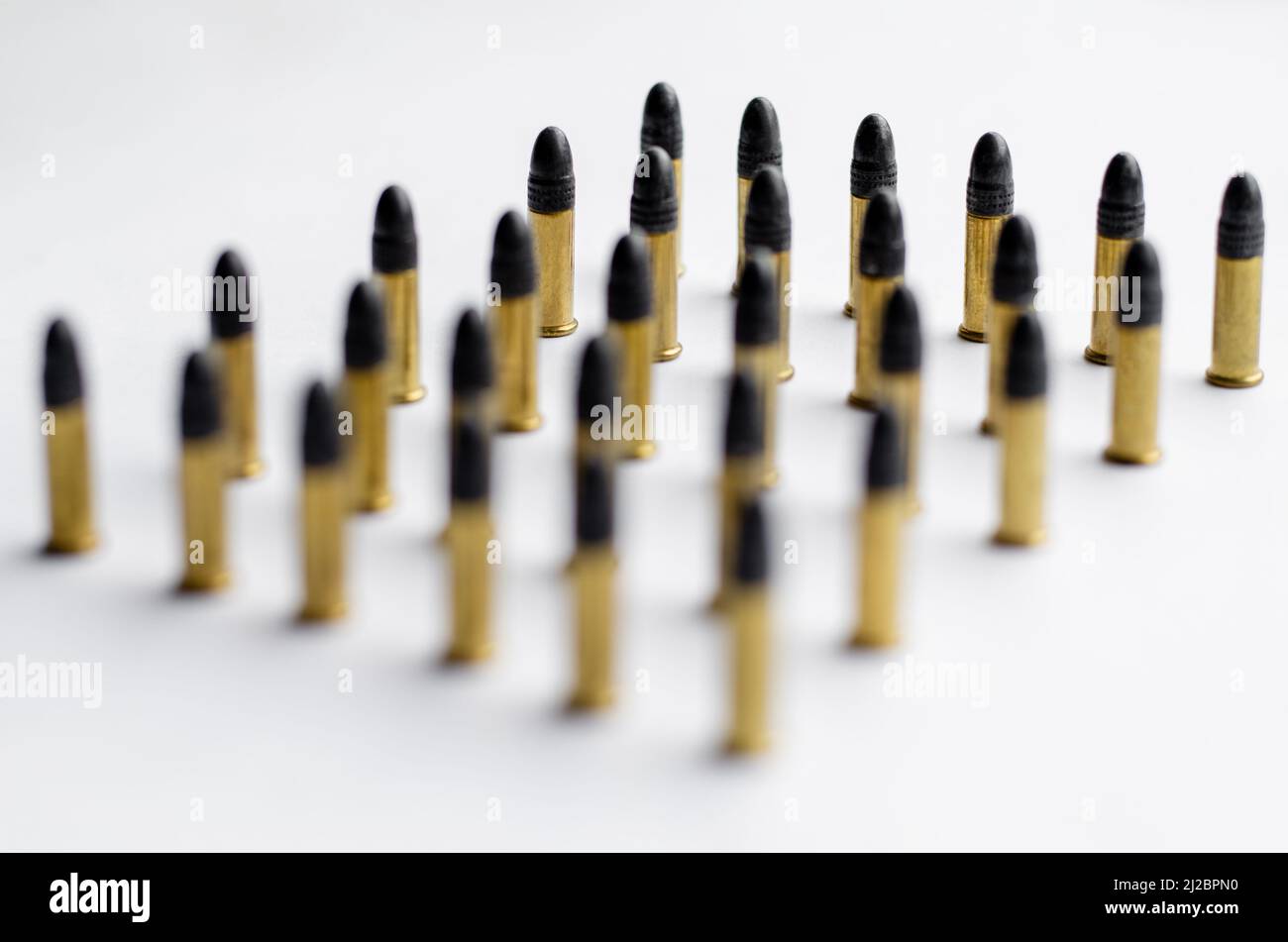 set of blurred bullets on white Stock Photo - Alamy