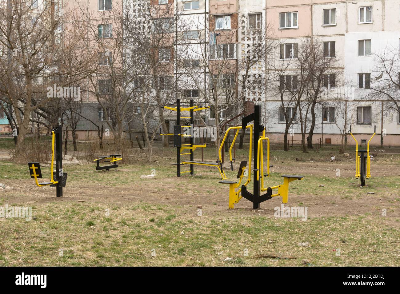 Outdoor gym in the courtyard of apartment buildings. Outdoor fitness ...