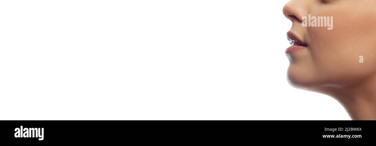 Cropped portrat of female face, nose, lips, chin isolated over white ...