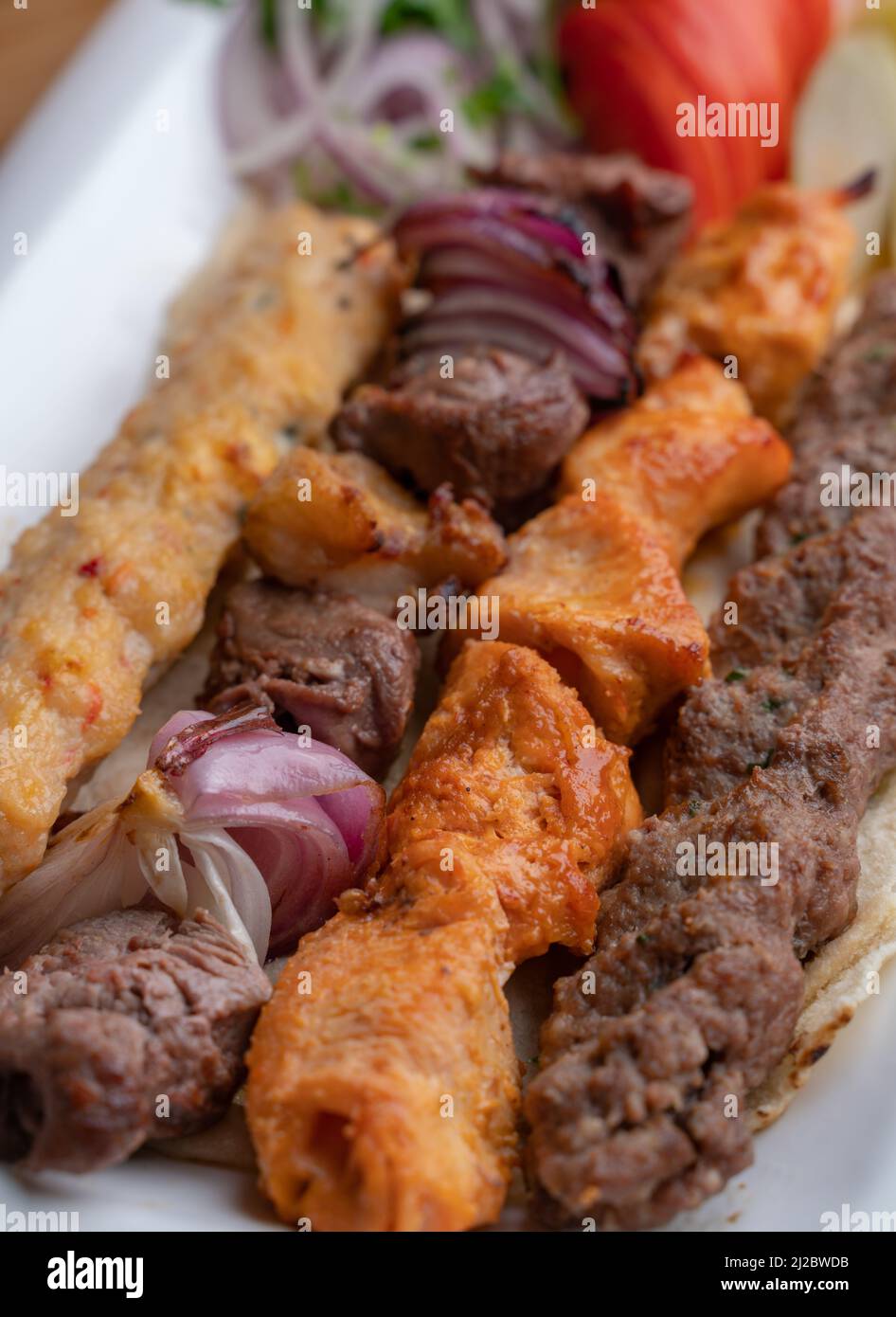 Arabic traditional food kufta and lamb brochette on the plate Stock ...
