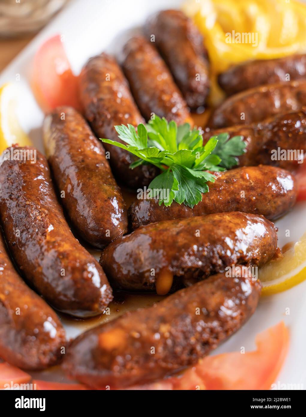 Lebanese food beef makanek close up shot Stock Photo - Alamy