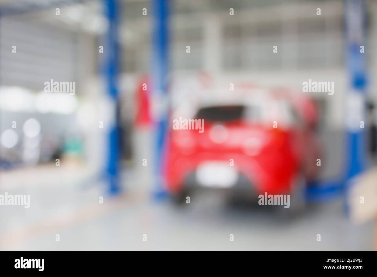 car repair service station blur background Stock Photo - Alamy